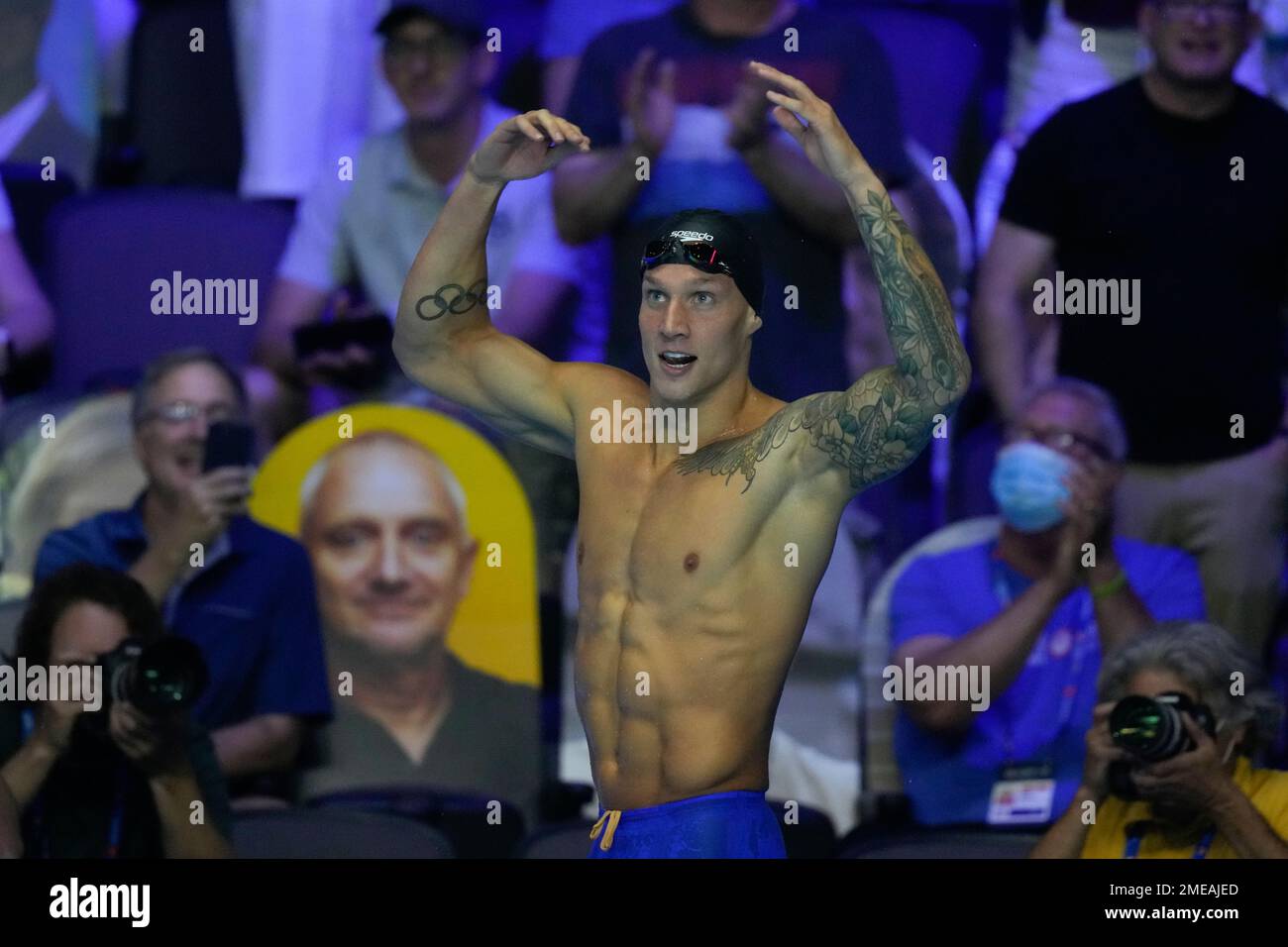 Caeleb Dressel celebrates after winning the men's 100-meter freestyle ...