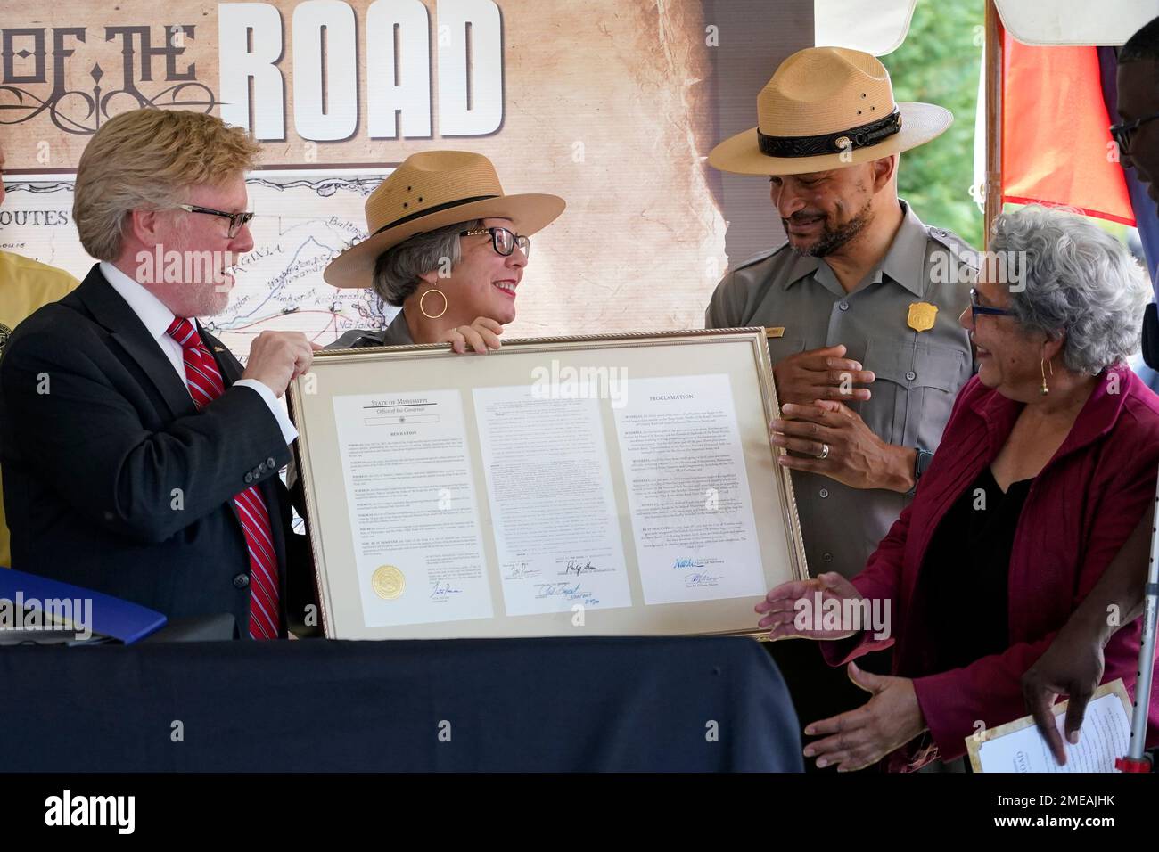 Natchez Mayor Dan Gibson, left, presents Superintendent Kathleen ...
