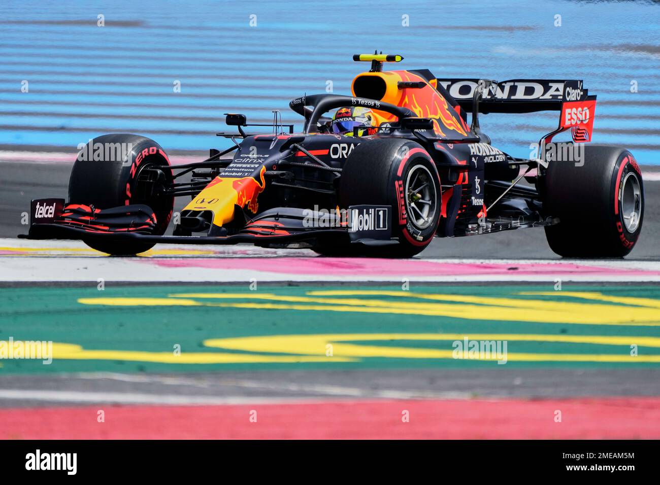 Red Bull driver Sergio Perez of Mexico steers his car during the first free practice for the ...