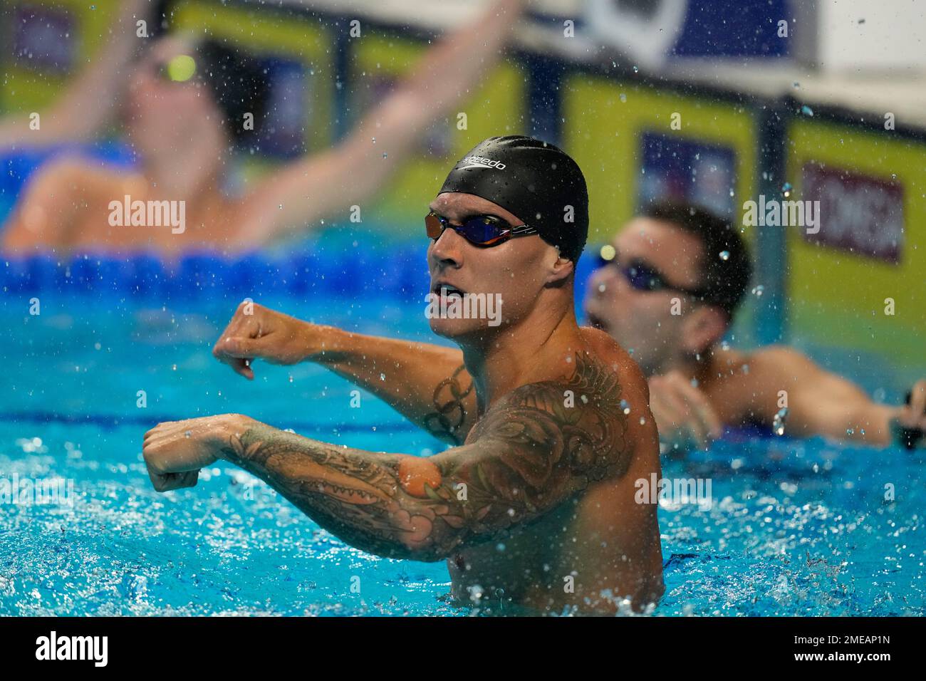 Caeleb Dressel reacts after winning the men's 100 freestyle during wave ...