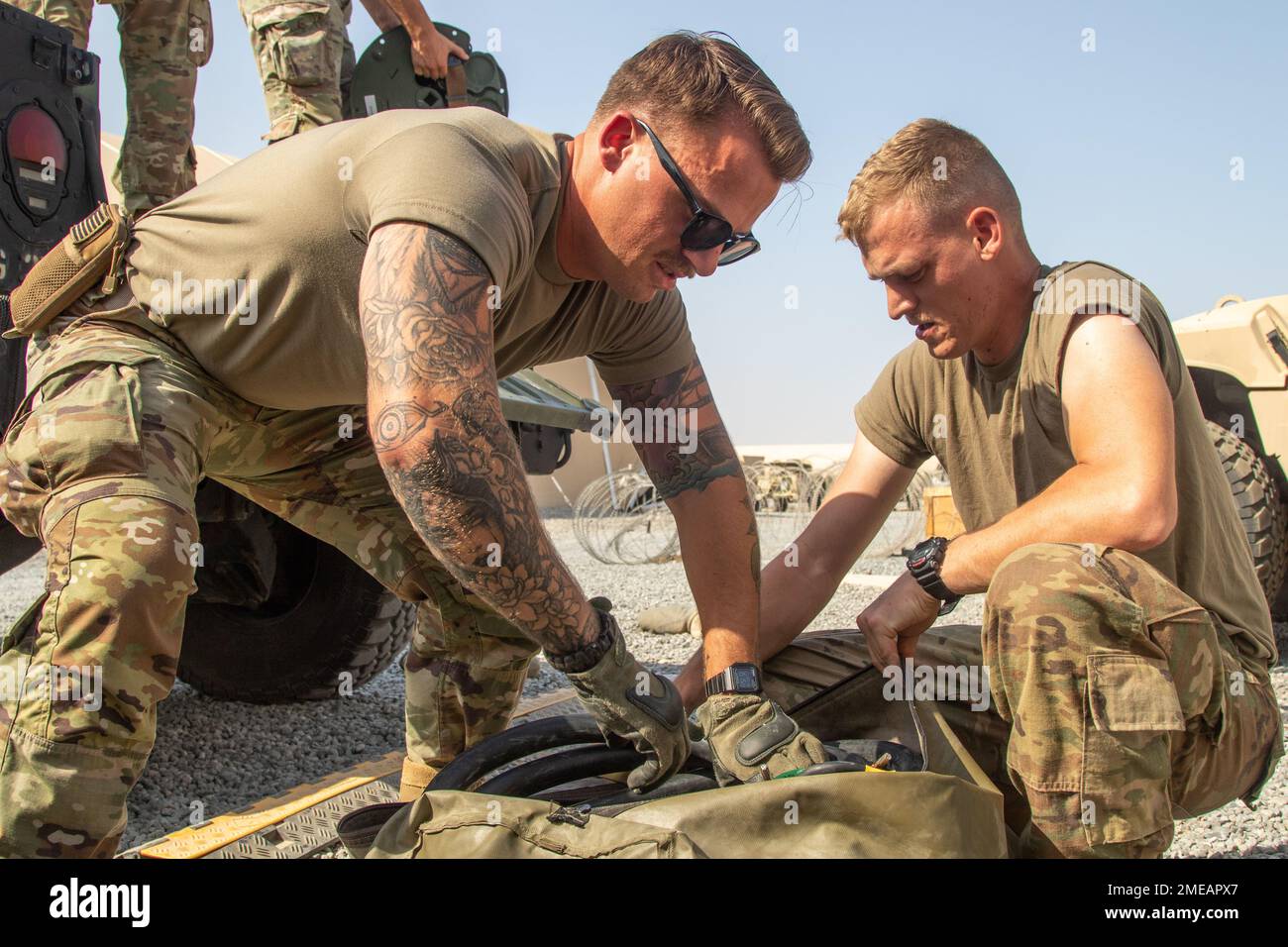 Soldiers from Charlie Company's signal and communication section ensure ...