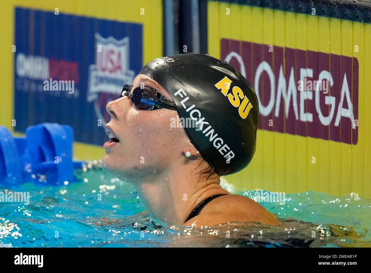 Hali Flickinger checks her time after competing in a semifinal in the ...