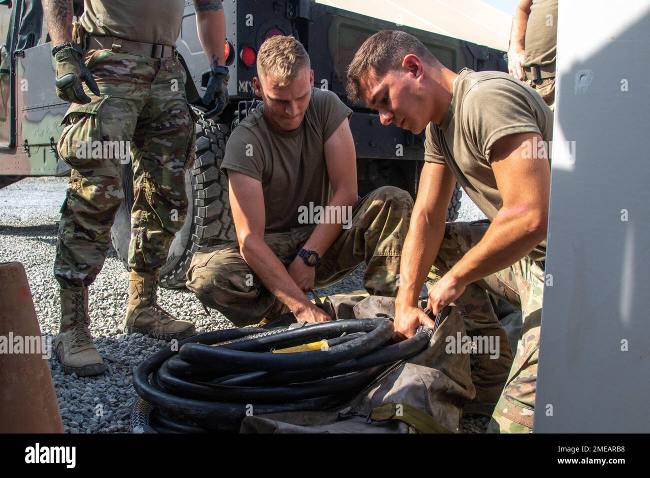Soldiers from Charlie Company's signal and communication section ensure ...