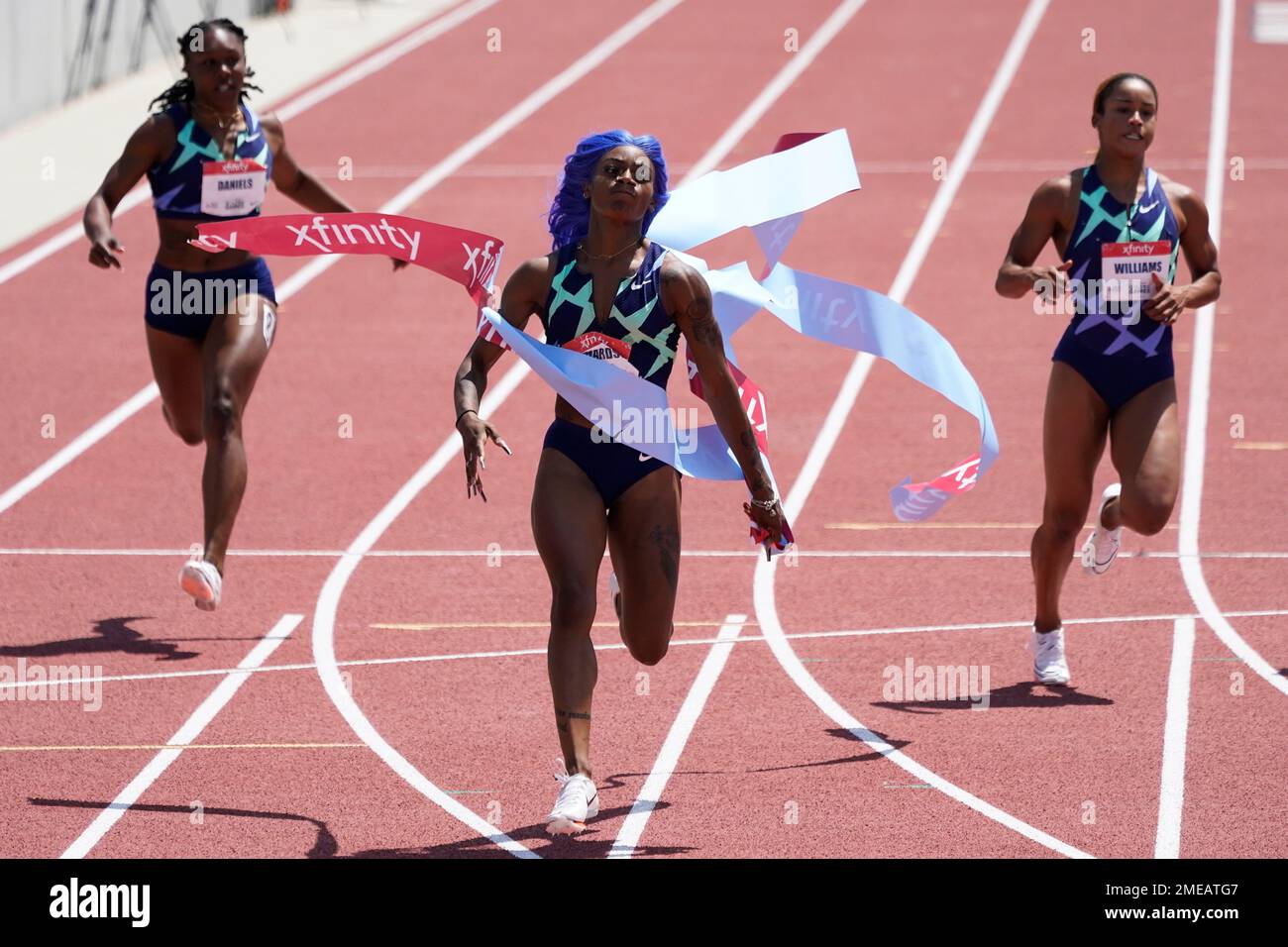 FILE - Sha'Carri Richardson, center, wins the women's 100-meter dash ...