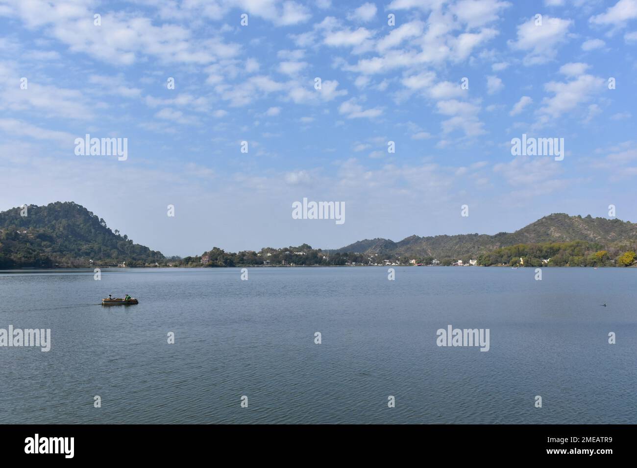 Mansar Lake, India. 24th Jan, 2023. Visitors enjoy the boat ride across ...