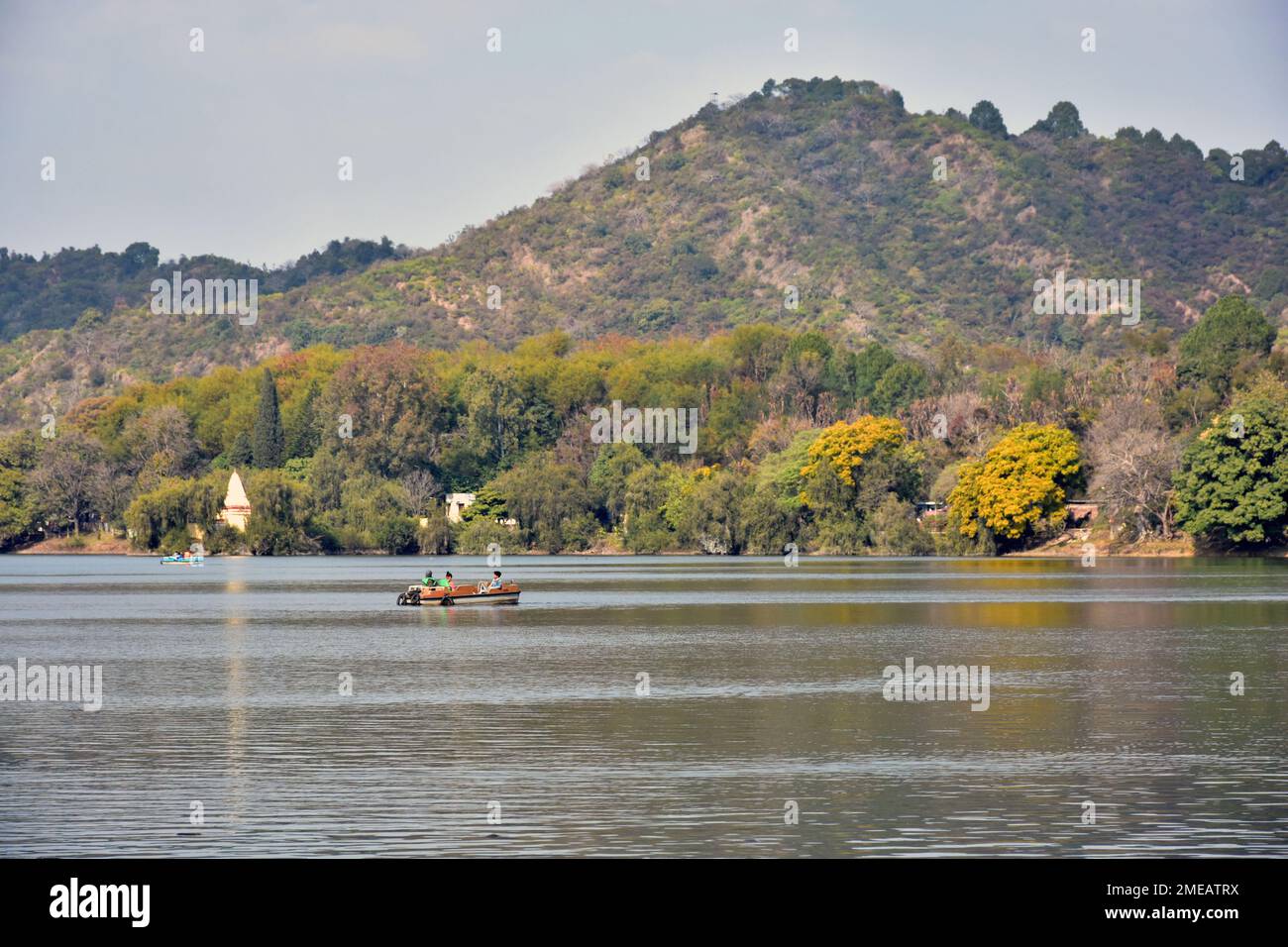 Mansar Lake, India. 24th Jan, 2023. Visitors enjoy the boat ride across ...