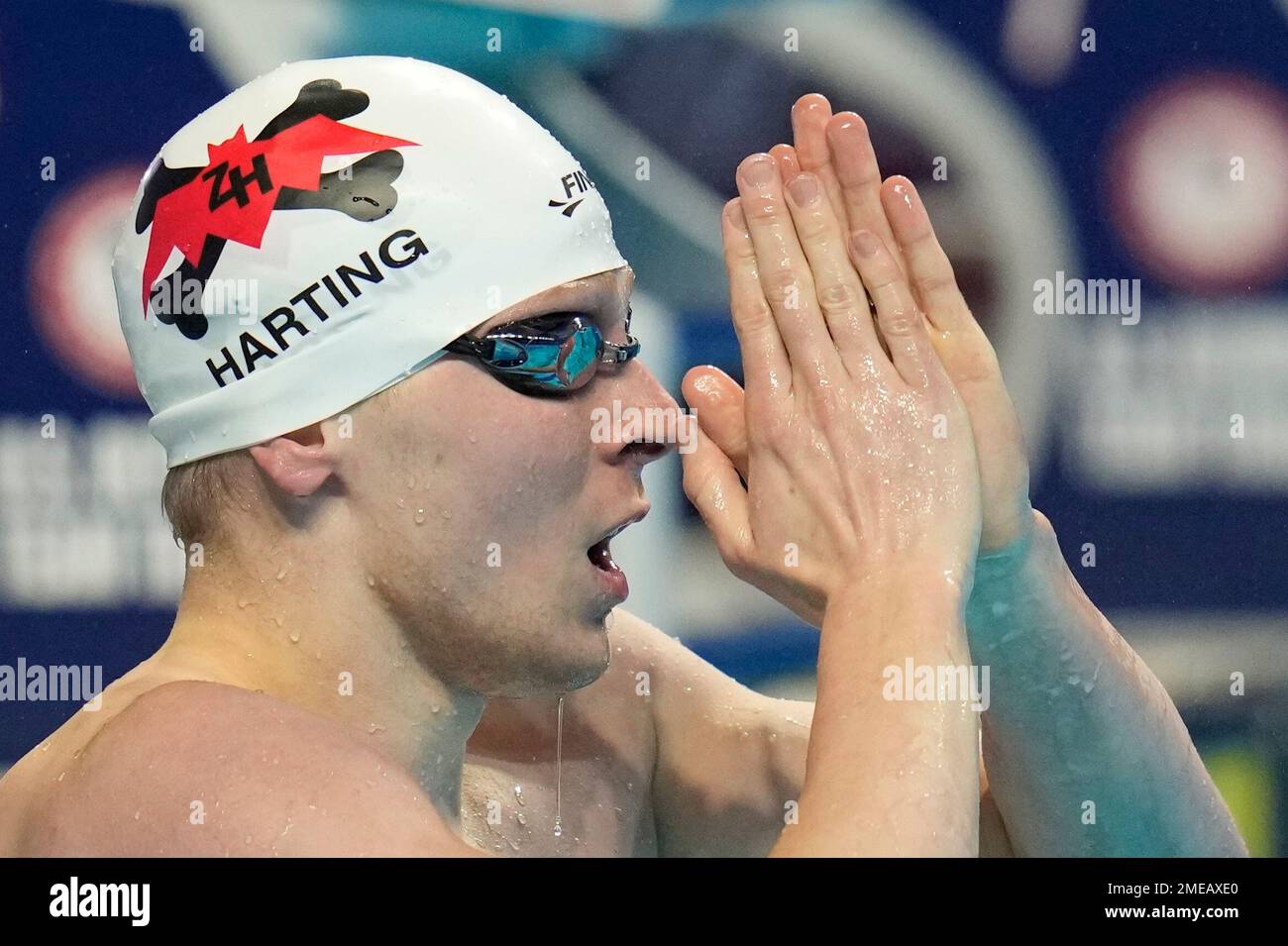 Zach Harting reacts after winning the men's 200 butterfly during wave 2 ...