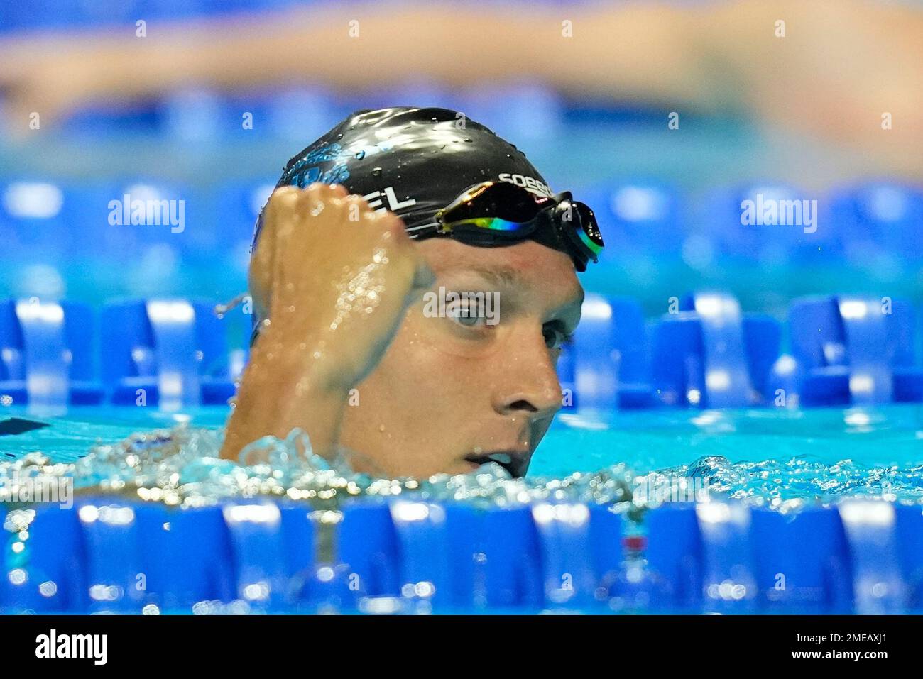 Caeleb Dressel reacts after winning his heat in the men's 100 freestyle ...