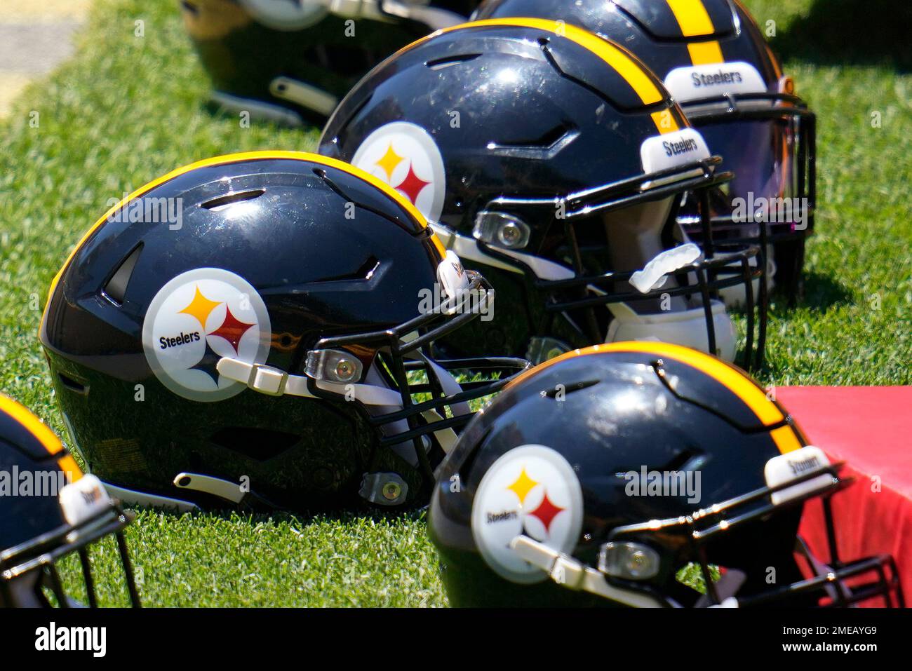Pittsburgh Steelers helmets sit on the field during the team's NFL mini ...