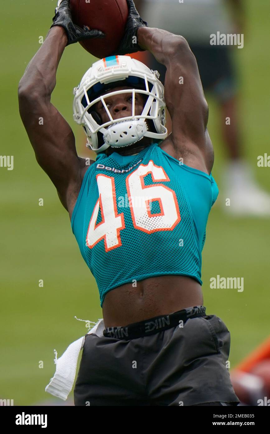 Miami Dolphins cornerback Tino Ellis catches a pass during a mandatory ...