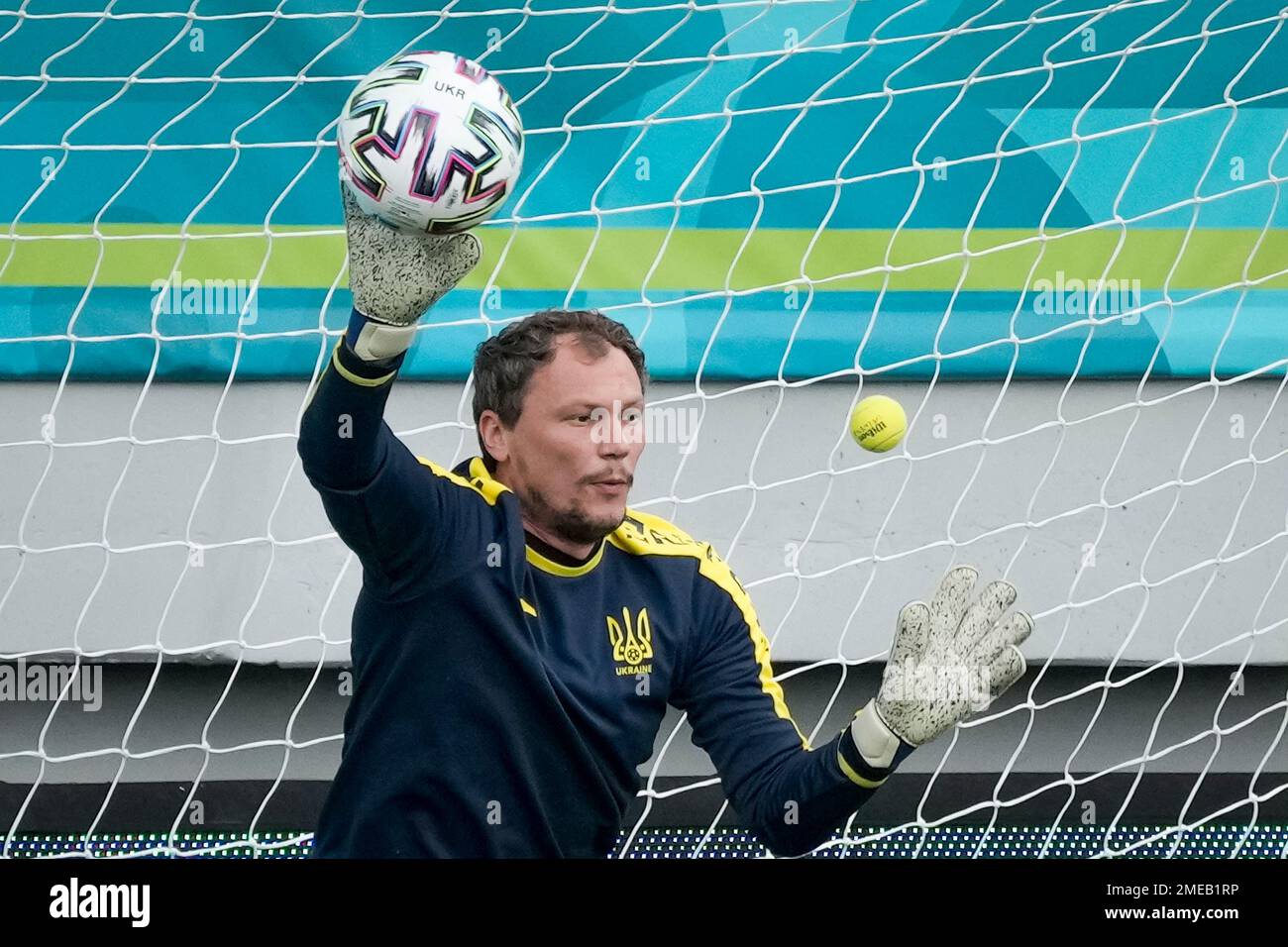 Ukraine's national soccer goalkeeper Andriy Pyatov warms up during the ...