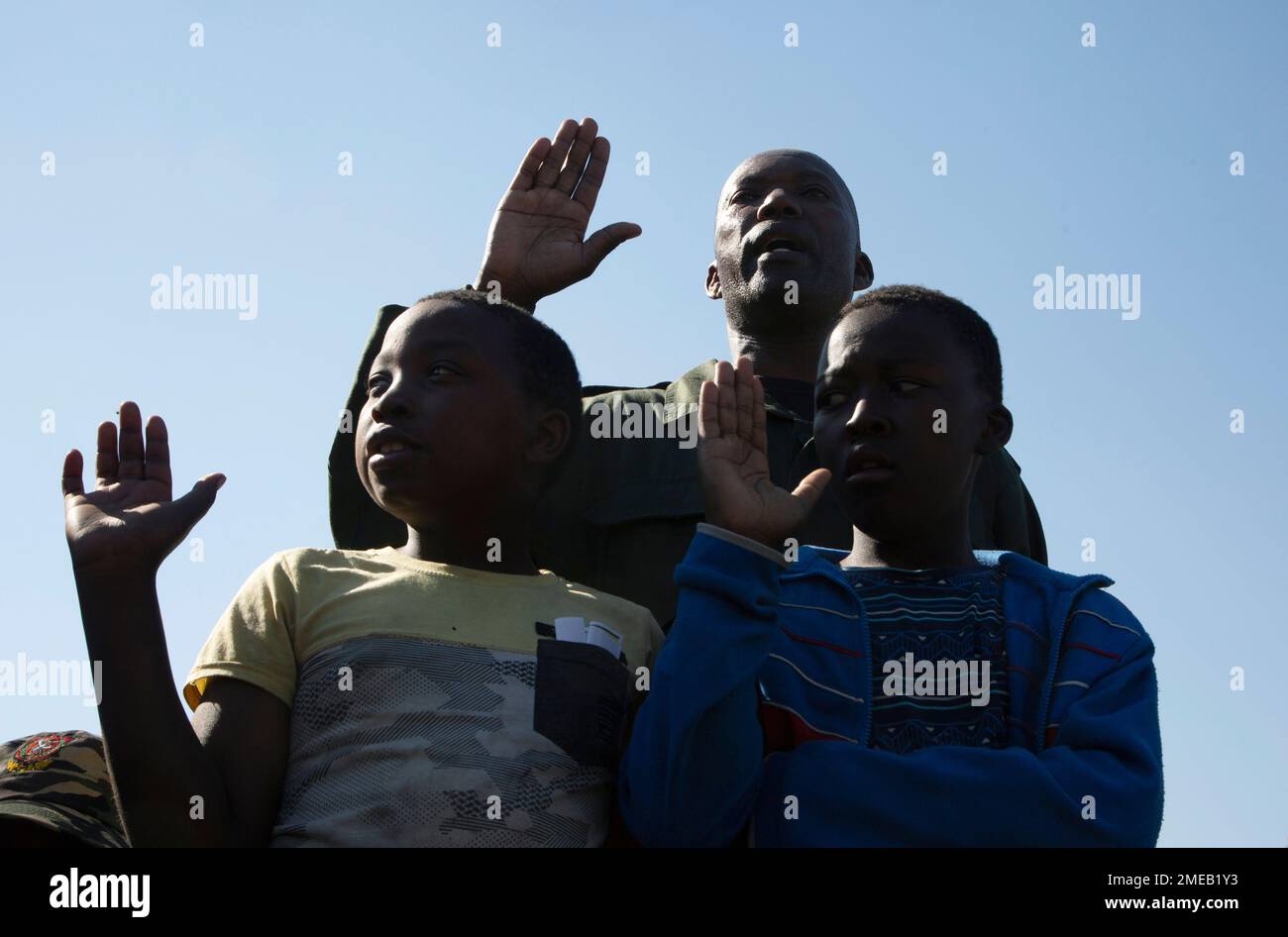People attend a commemoration at the Hector Petersen Memorial in Soweto ...