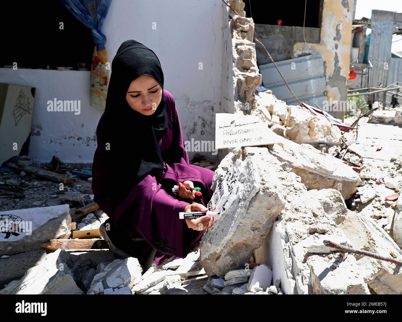 Artist Saja Moussa draws on broken tiles from her family's house in ...