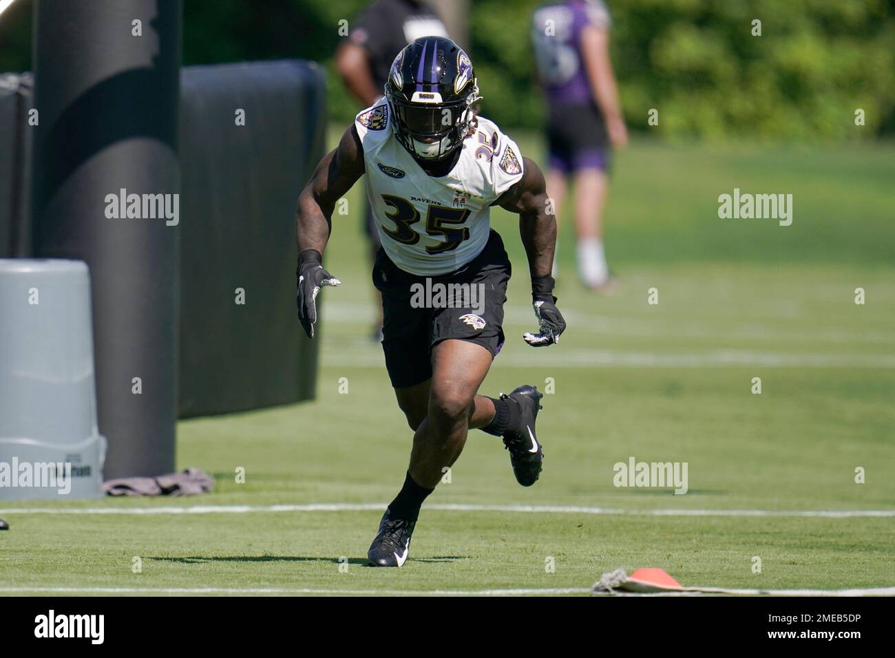 Baltimore Ravens running back Gus Edwards works out during the team's ...