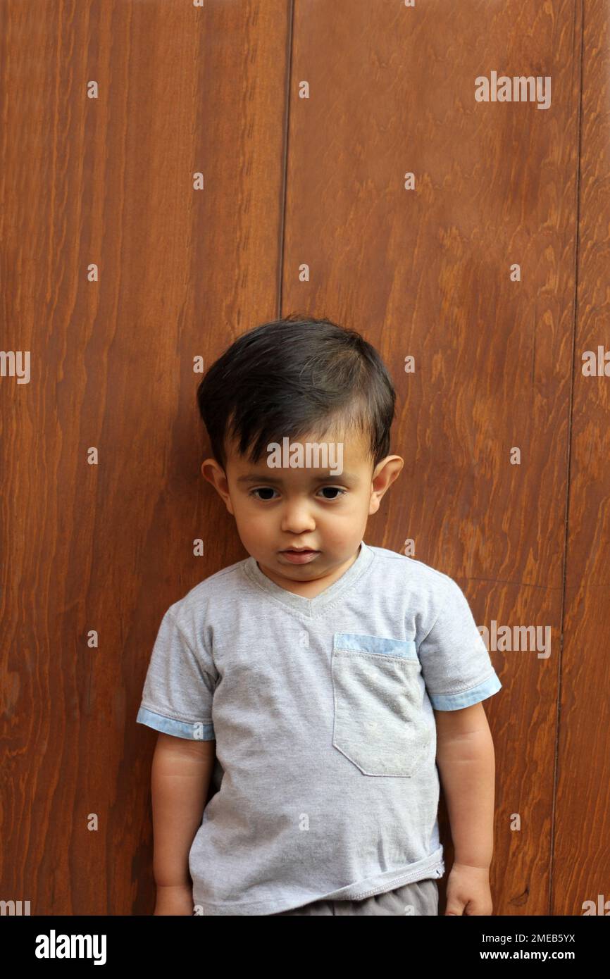 2-year-old young brown-haired Latino boy with Asperger's Syndrome which ...