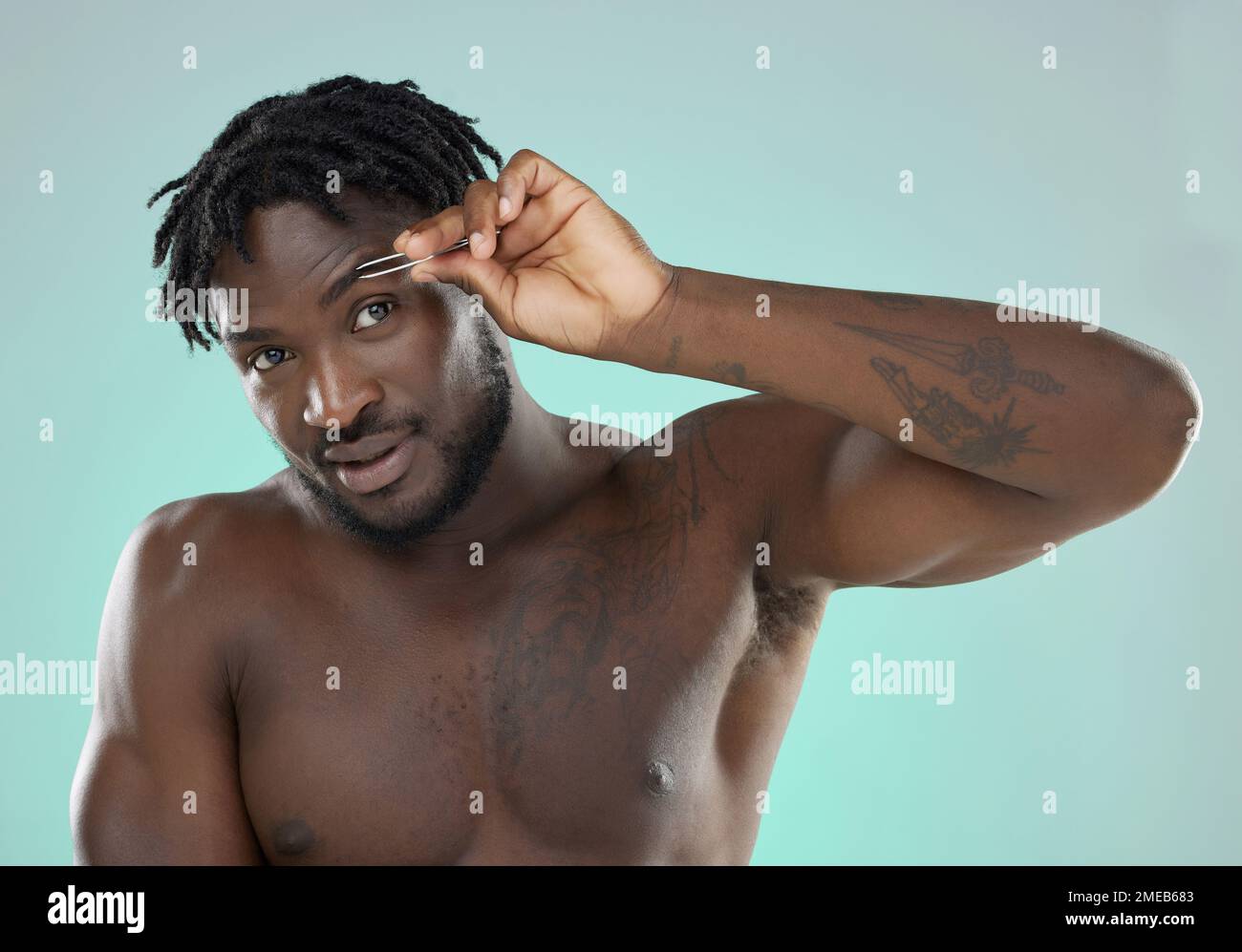 Black man, eyebrow and tweezer in studio for portrait, beauty grooming or cosmetics by blue ...