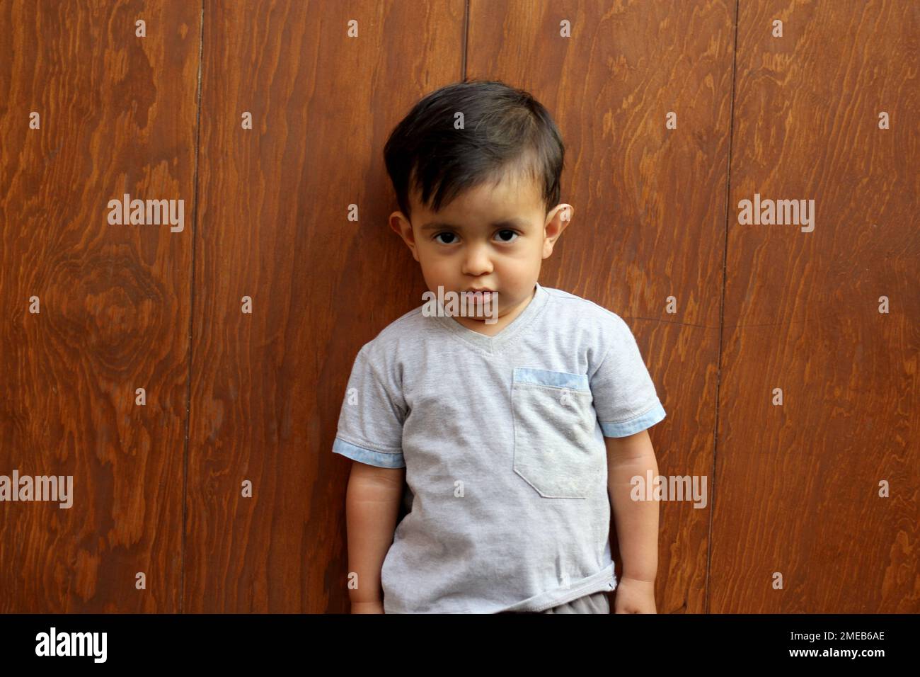 2-year-old young brown-haired Latino boy with Asperger's Syndrome which ...
