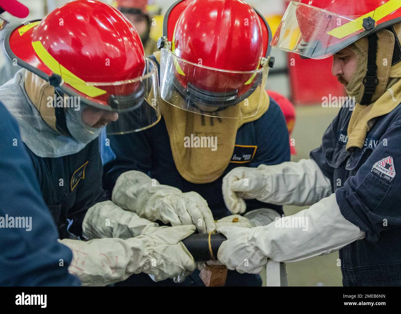 Sailors assigned to USS Gerald R. Ford (CVN 78), demonstrate pipe ...