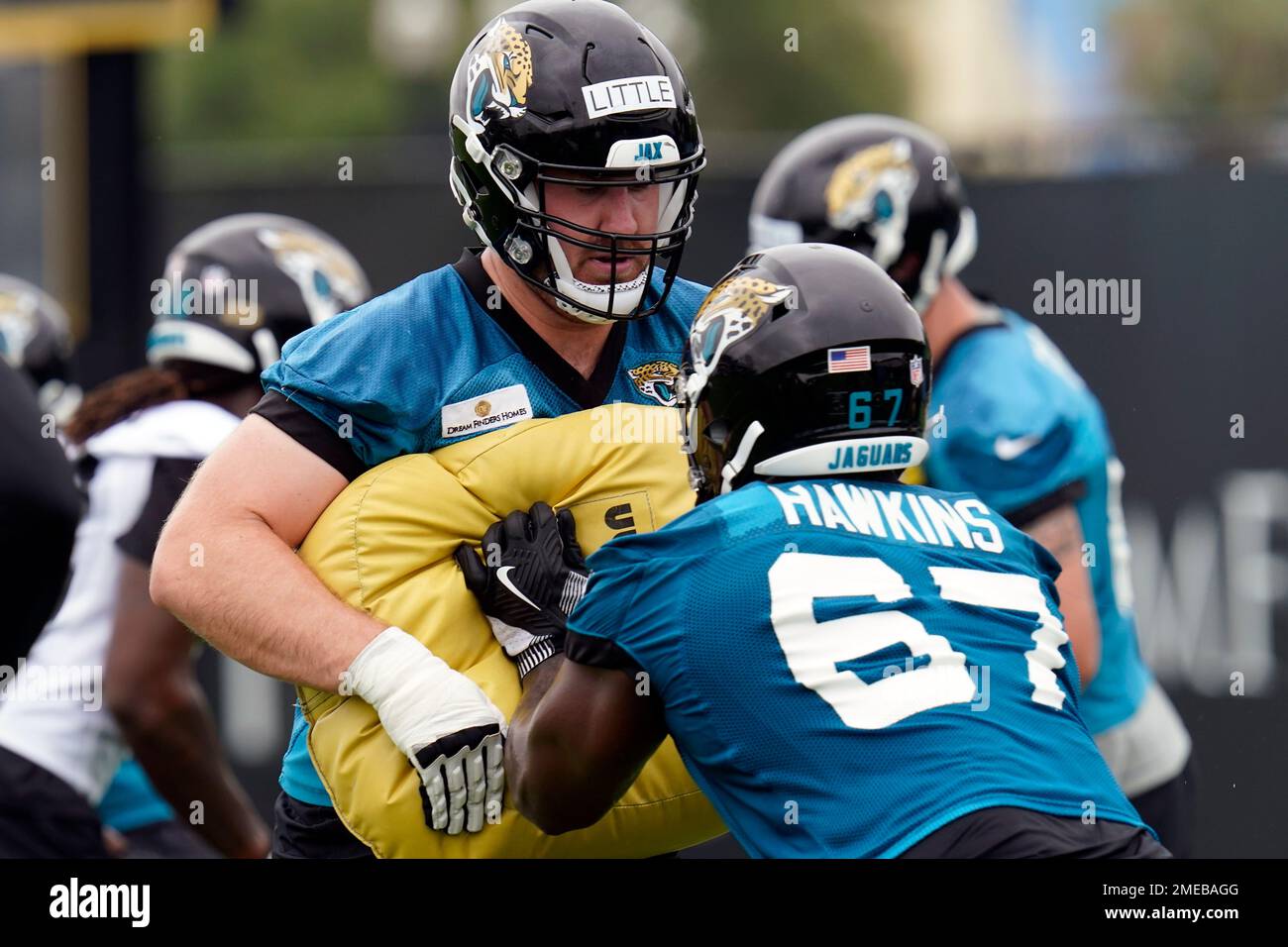 Jacksonville Jaguars offensive tackle Walker Little, left, and ...