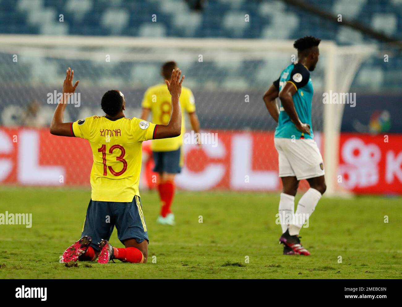 Colombia's Yerry Mina, left, celebrates winning 1-0 against Ecuador at ...