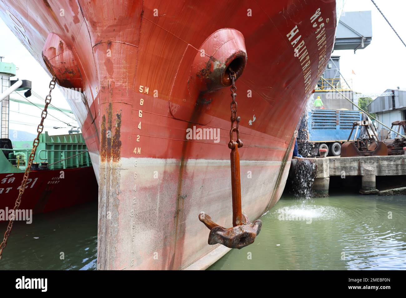 Bow and anchor of a cargo ship mooring at a pier in Songkhla, Thailand ...