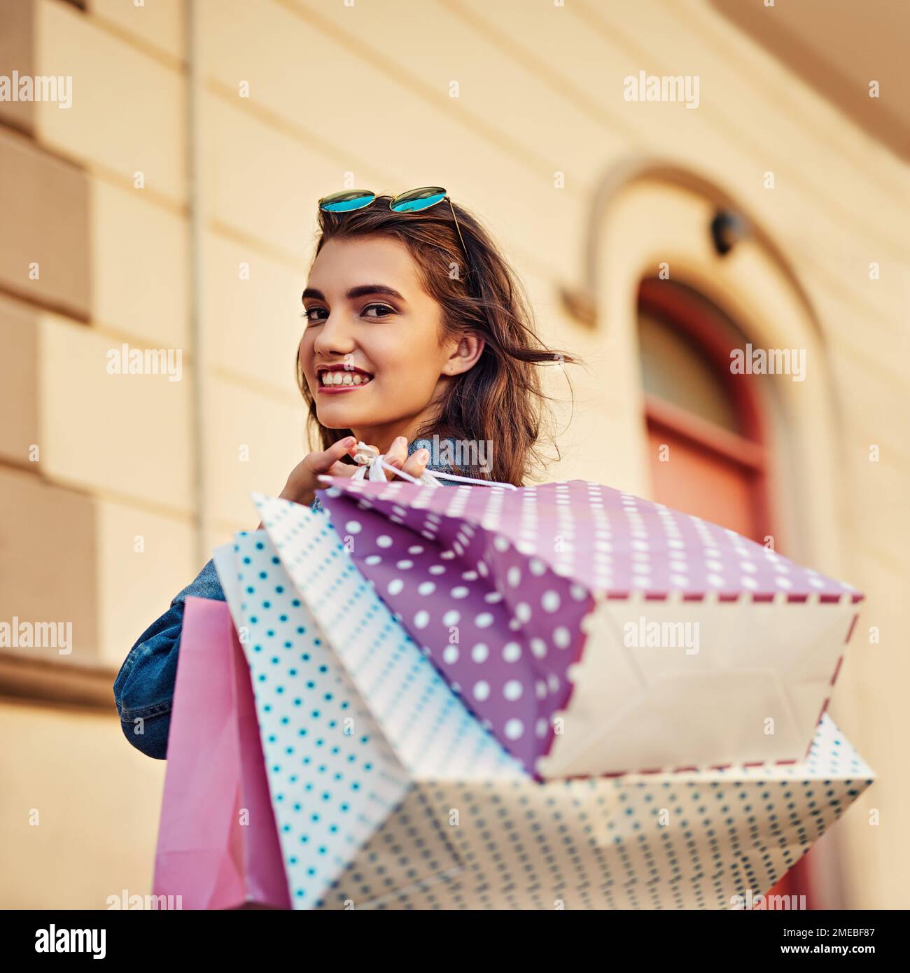 Im always smiling when Im shopping. a beautiful young woman on a ...