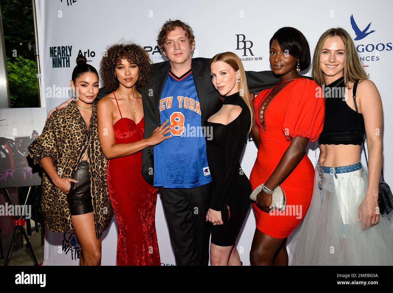 Director Eamon O'Rourke, center, poses with actors Vanessa Hudgens, left, Alexandra Shipp ...