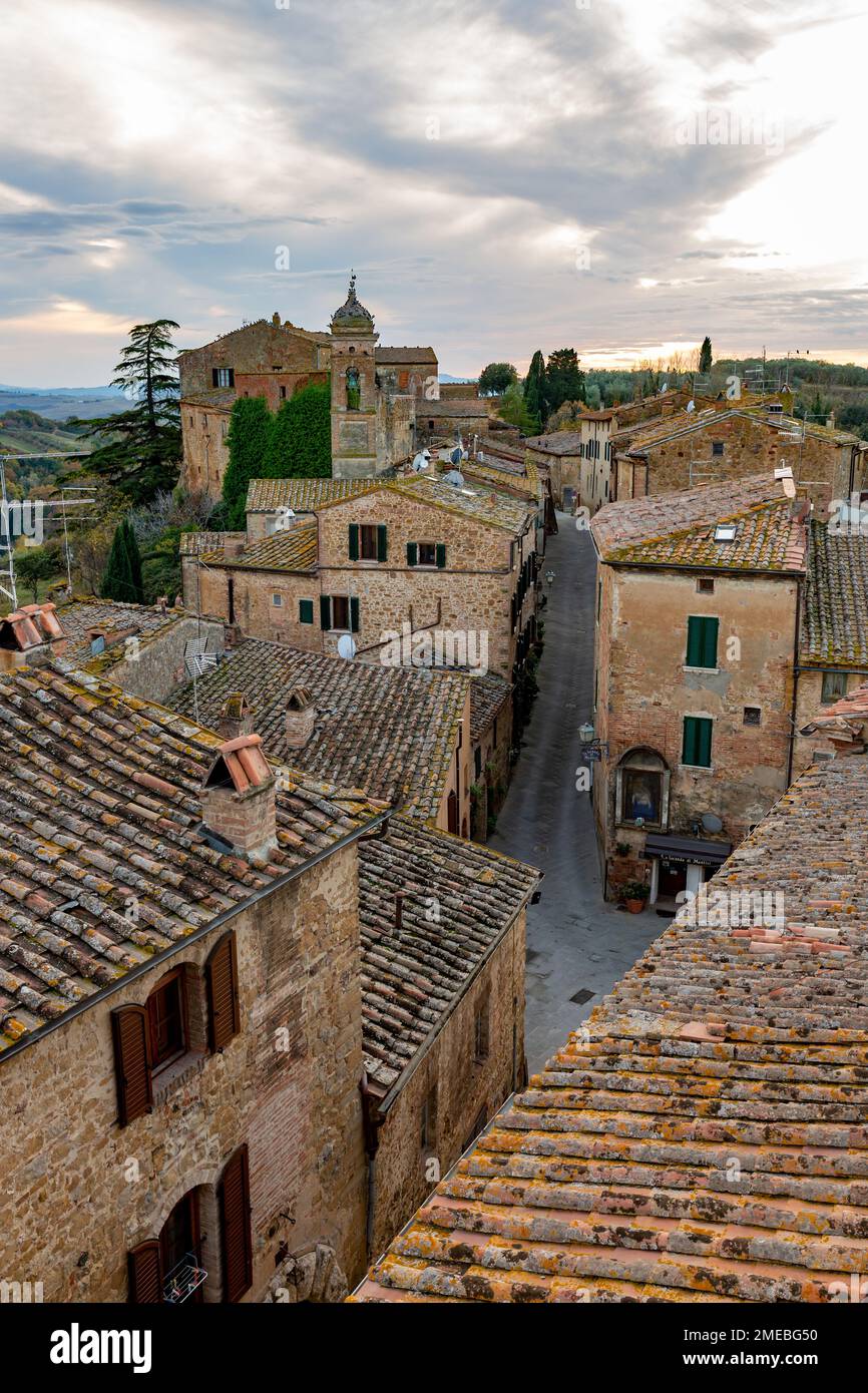 View of the tops of stone buildings with terracotta roof tiles, in the ...