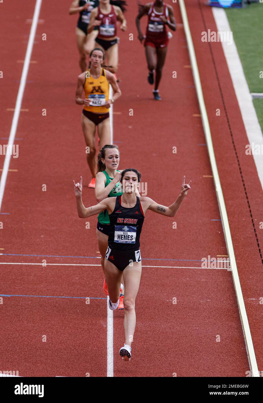 North Carolina State's Elly Henes wins the women's 5,000 meters ahead ...