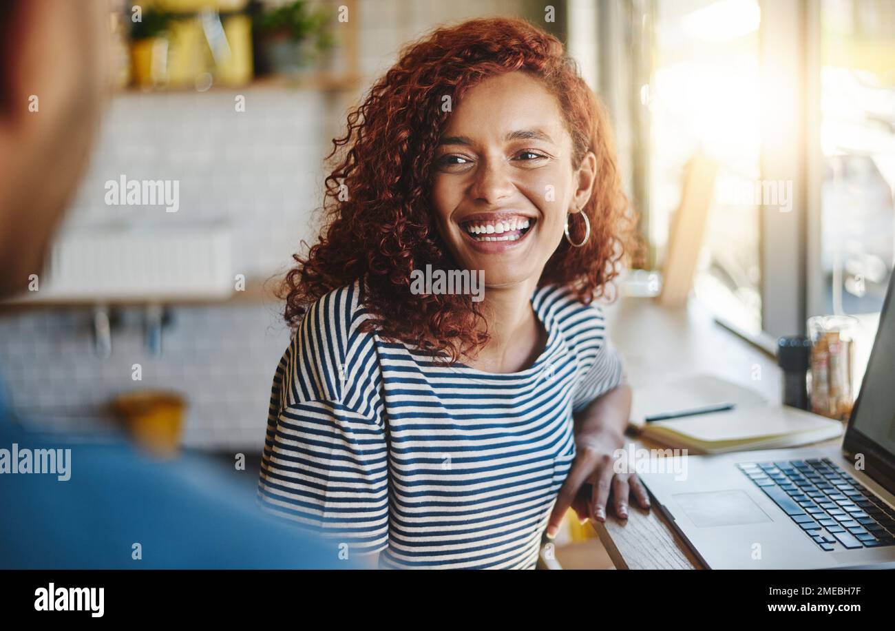 They work as a team in and out of the office. two people having a ...