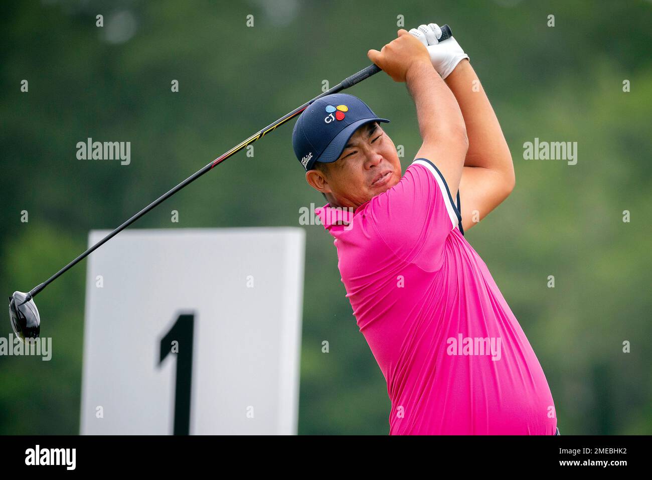 Byeong Hun An, of South Korea, hits off the first tee during the third ...