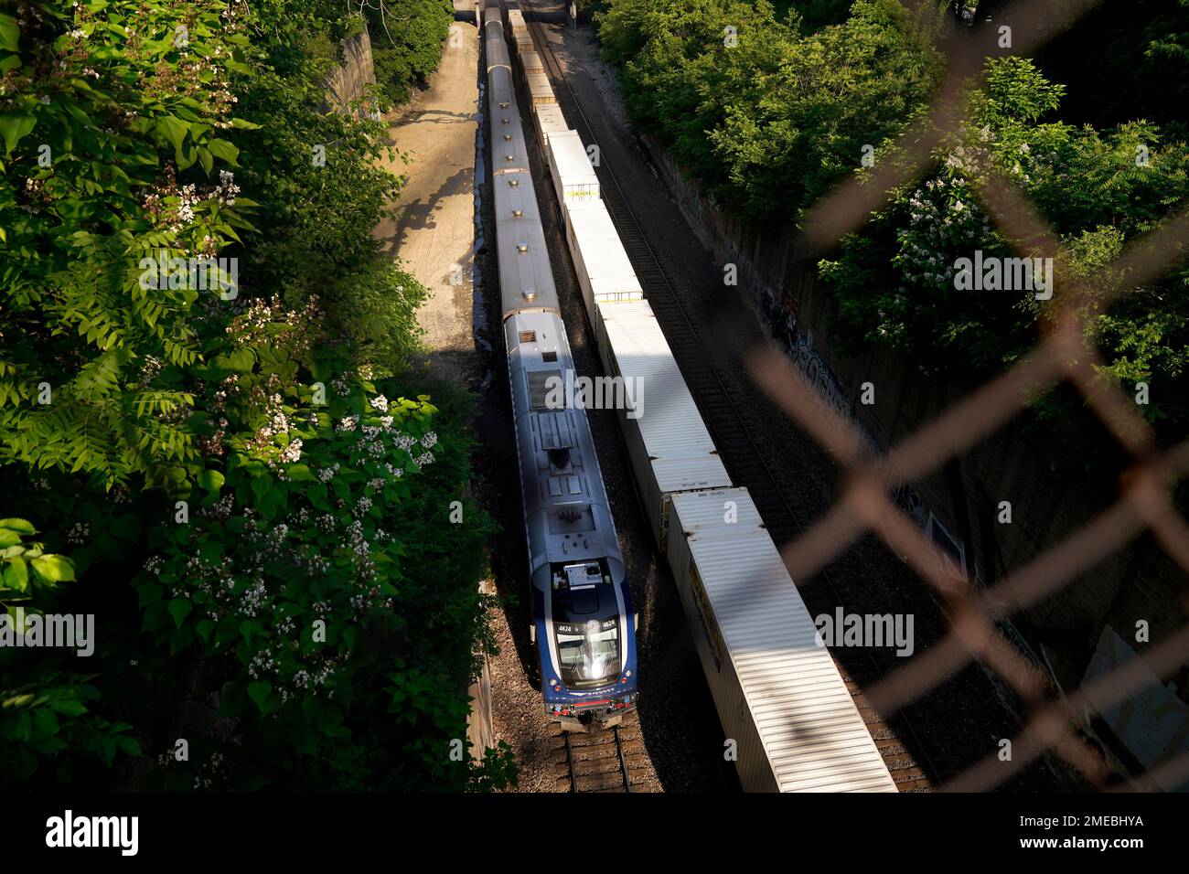 The Missouri River Runner Amtrak train travels alongside a freight ...