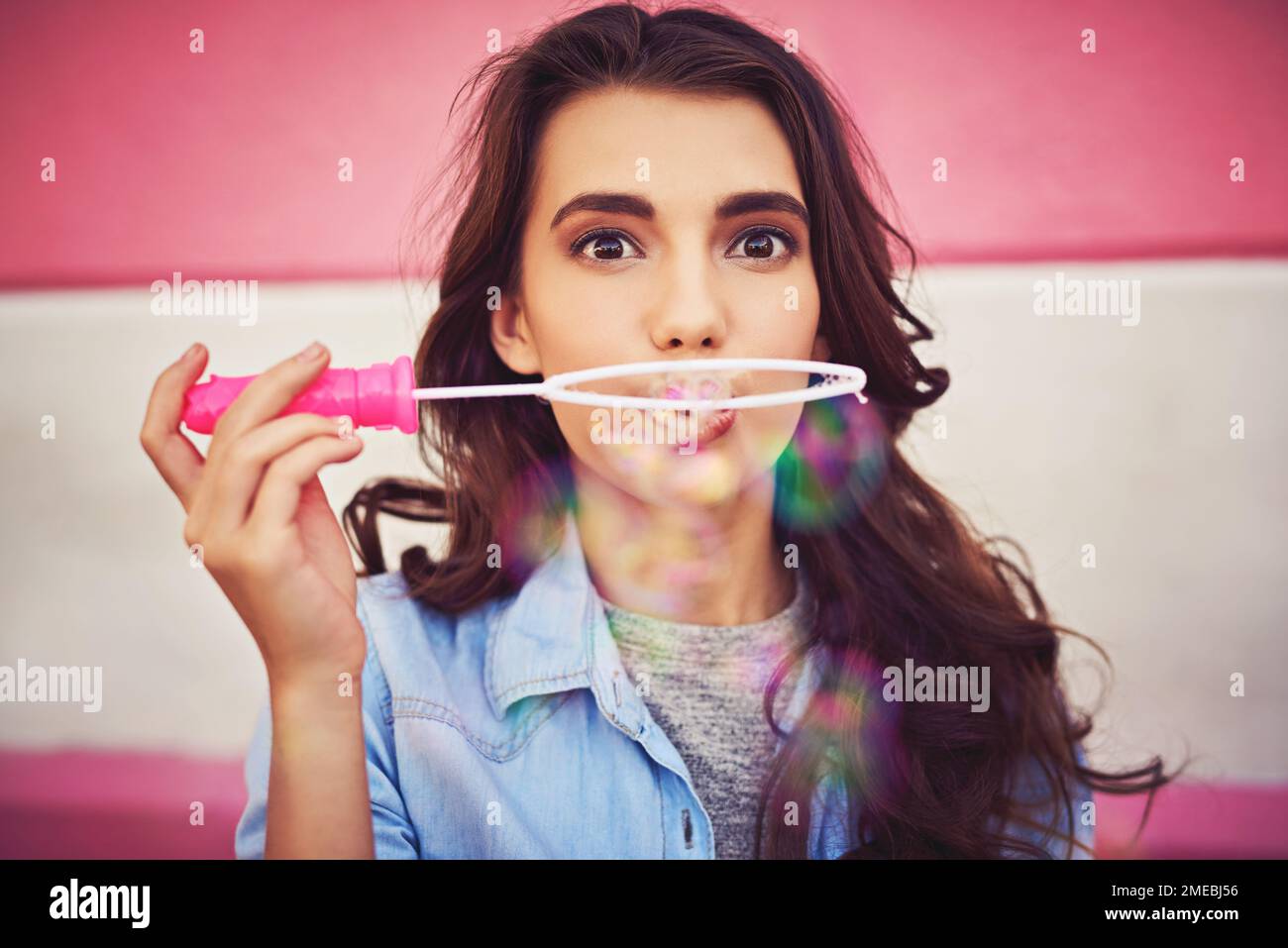 Beautiful female blowing bubbles hi-res stock photography and images ...