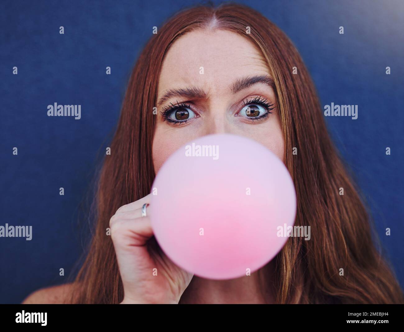 Closeup Portrait Girl And Bubblegum By Wall Outdoor And Urban