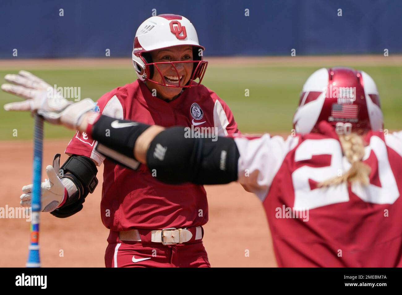 Oklahoma's Jayda Coleman, left, celebrates her home run with teammate ...