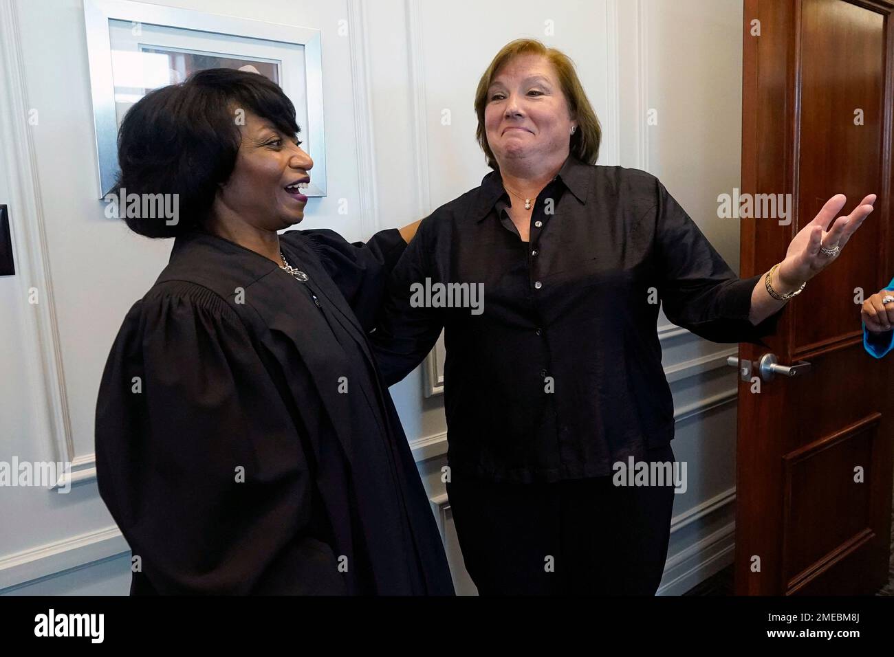 New U.S. District Chief Judge Debra M. Brown for the Northern District, left, jokes with Judge ...