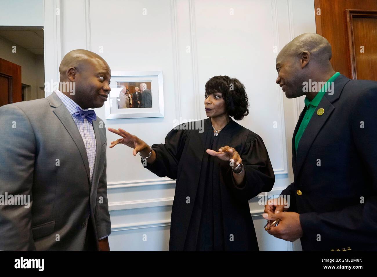 New U.S. District Chief Judge Debra M. Brown for the Northern District, center, confers with ...