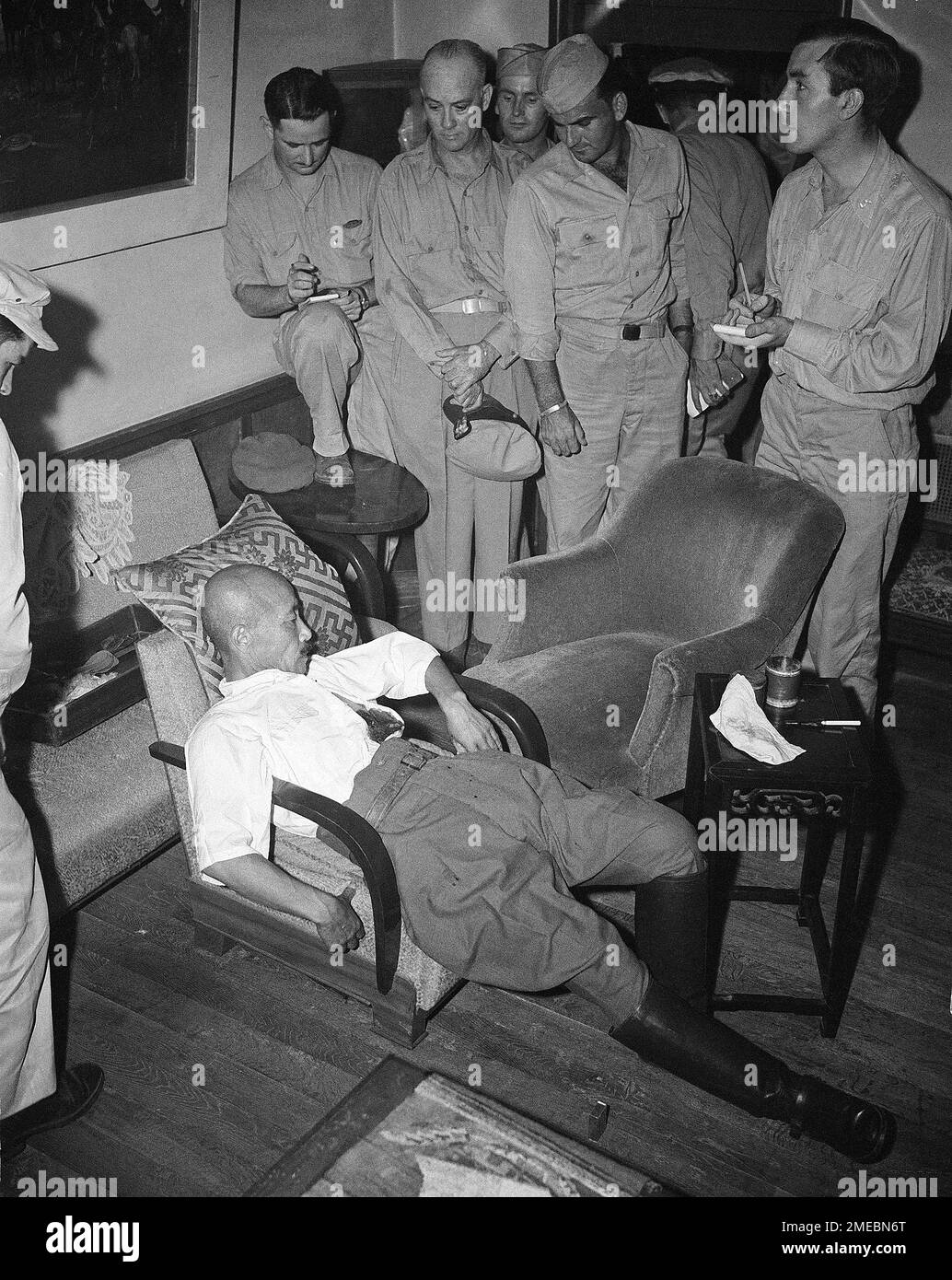 With a bullet wound just below the heart, Gen. Hideki Tojo, former ...