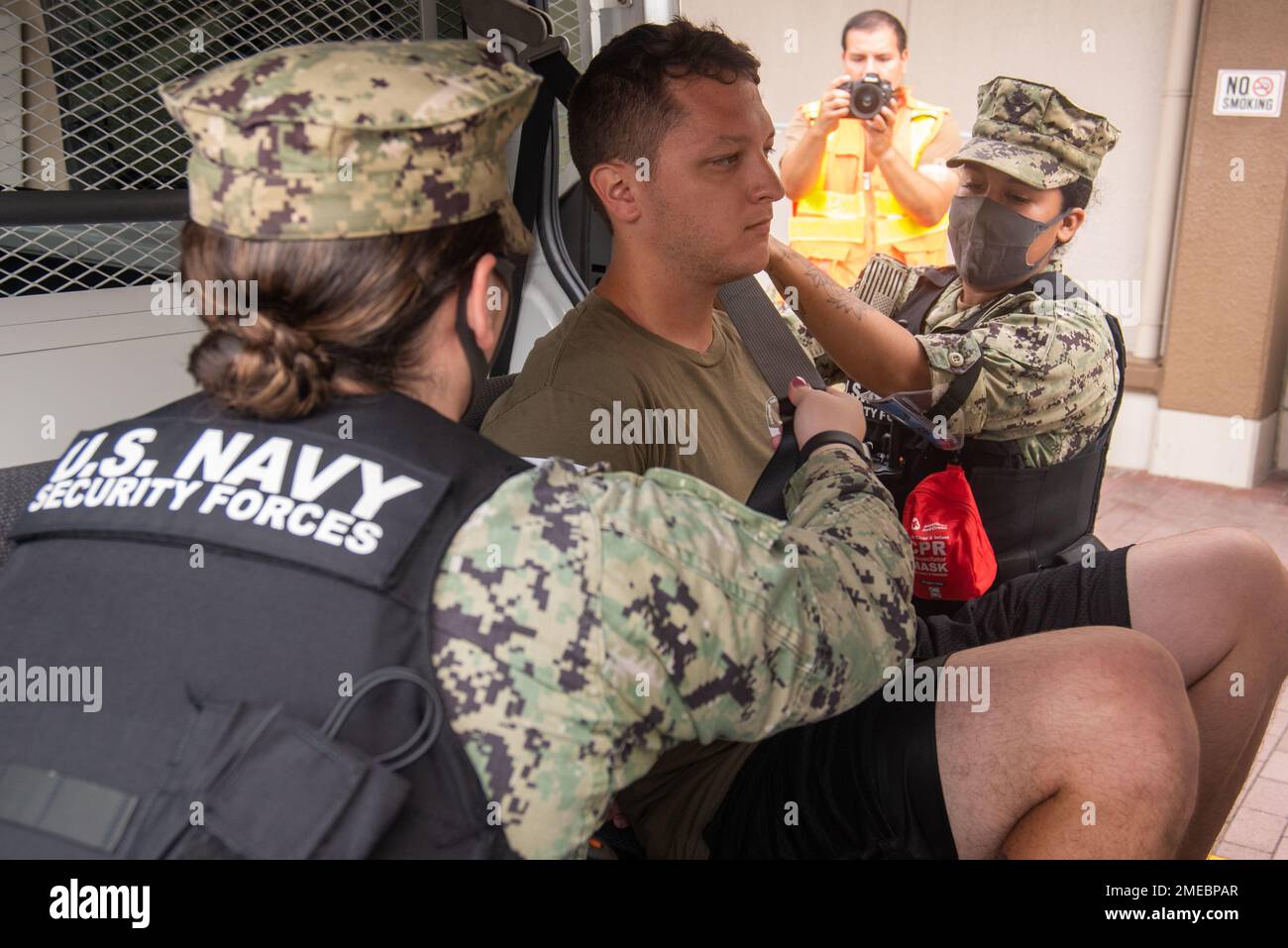 Master-at-Arms 3rd Class Michaela Kane, left, and Master-at-Arms 3rd ...