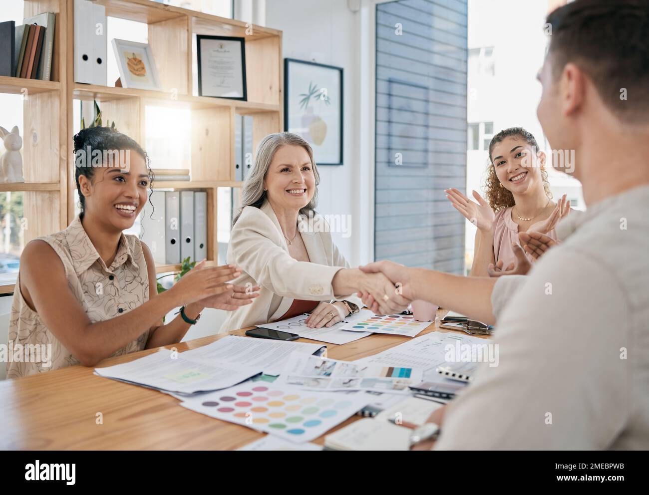 Partnership handshake, applause and business people in office. Welcome ...