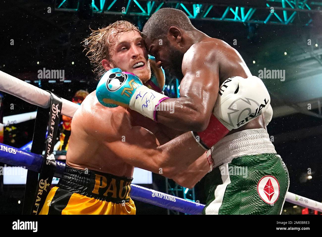 Logan Paul, left, and Floyd Mayweather fight during an exhibition ...