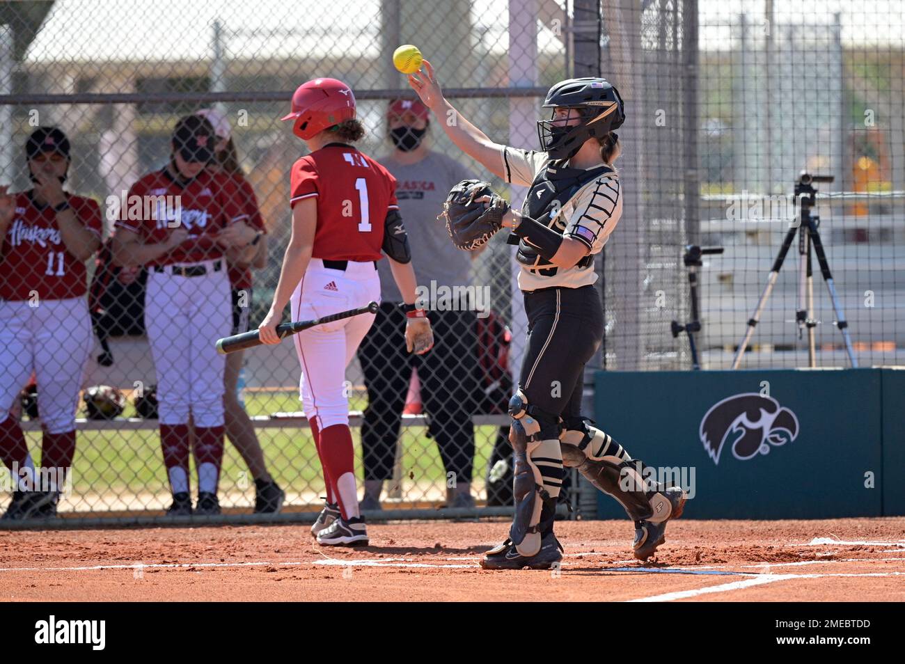 Purdue catcher Kiley Goff throws back to the pitcher during an NCAA ...