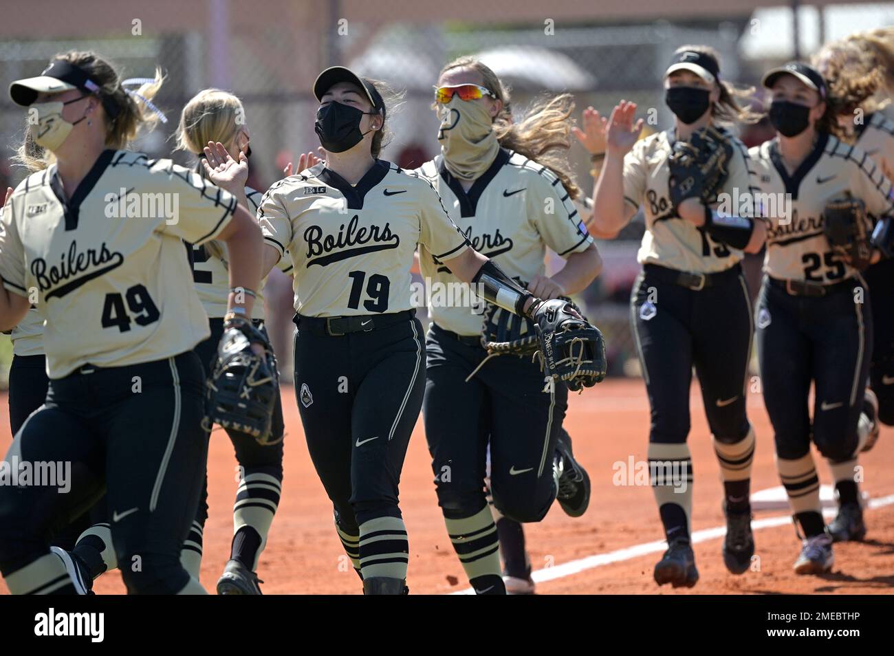 Purdue players wear face masks to help curb the spread of COVID-19 ...