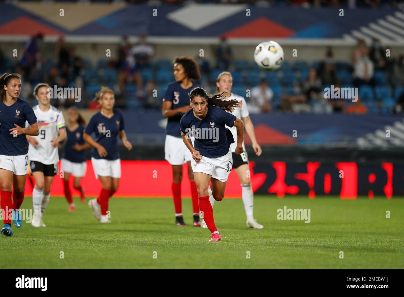 France's Amel Majri (10) chases the ball during an international ...