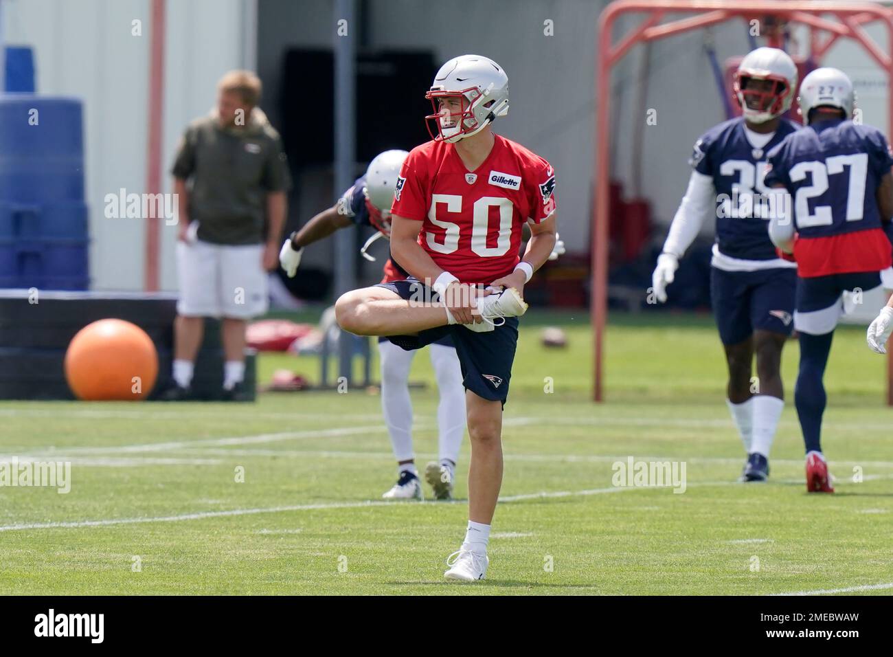 New England Patriots quarterback Mac Jones (50) warms up during an NFL ...