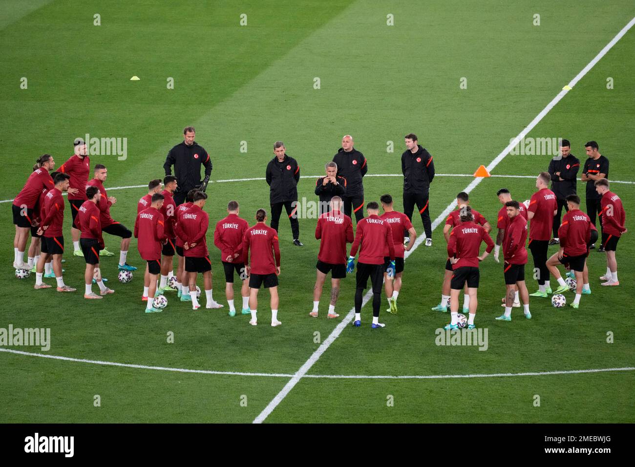 Turkey's manager Senol Gunes talks to players during a training session ...