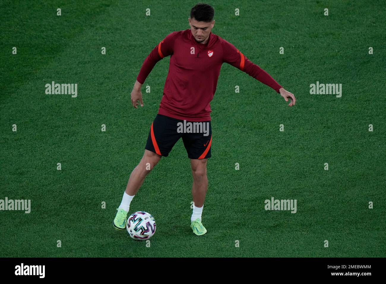 Turkey's Cengiz Under goes for the ball during a training session ahead ...