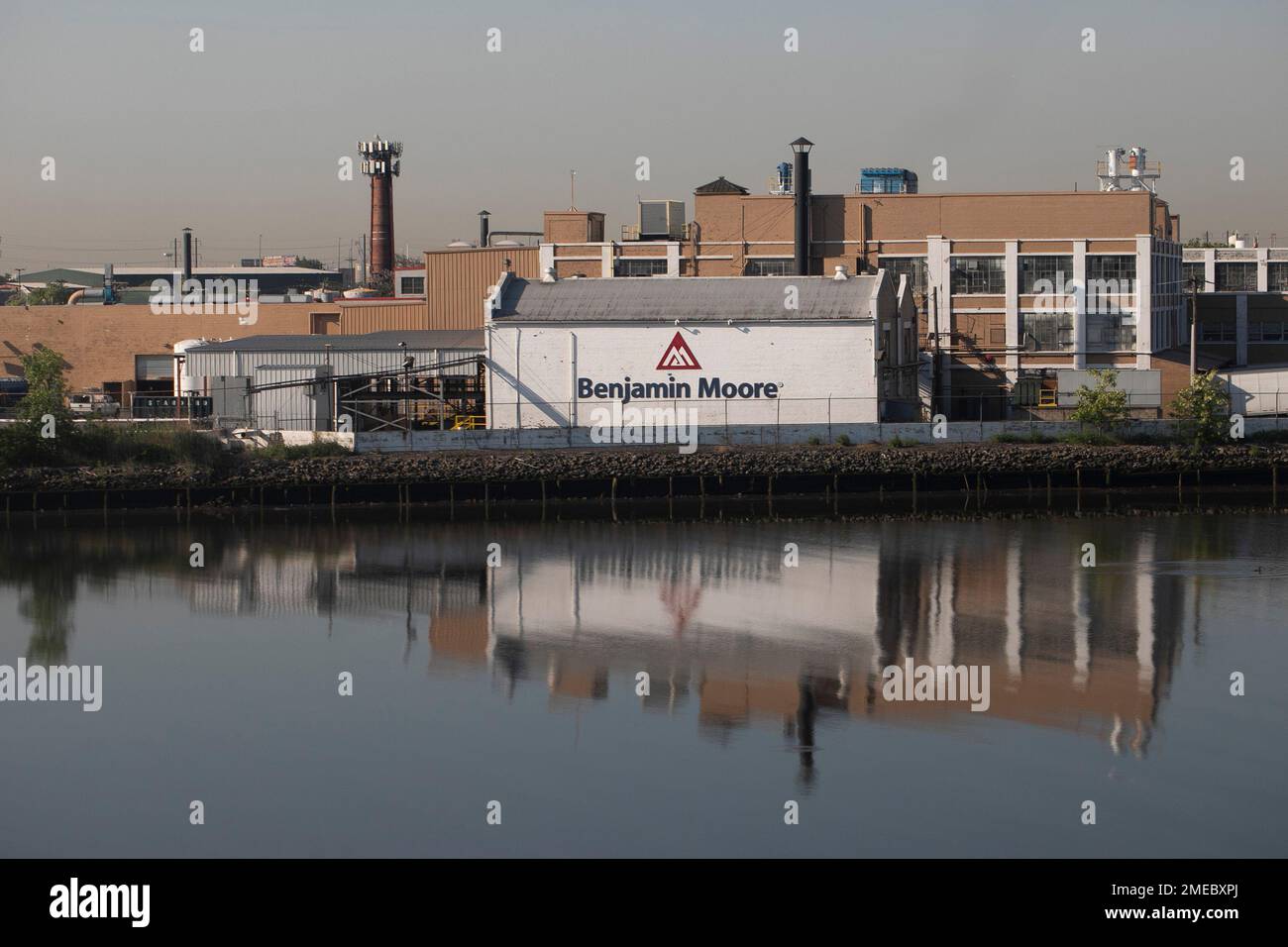 This May 18, 2021, photo shows a Benjamin Moore factory in New Jersey ...