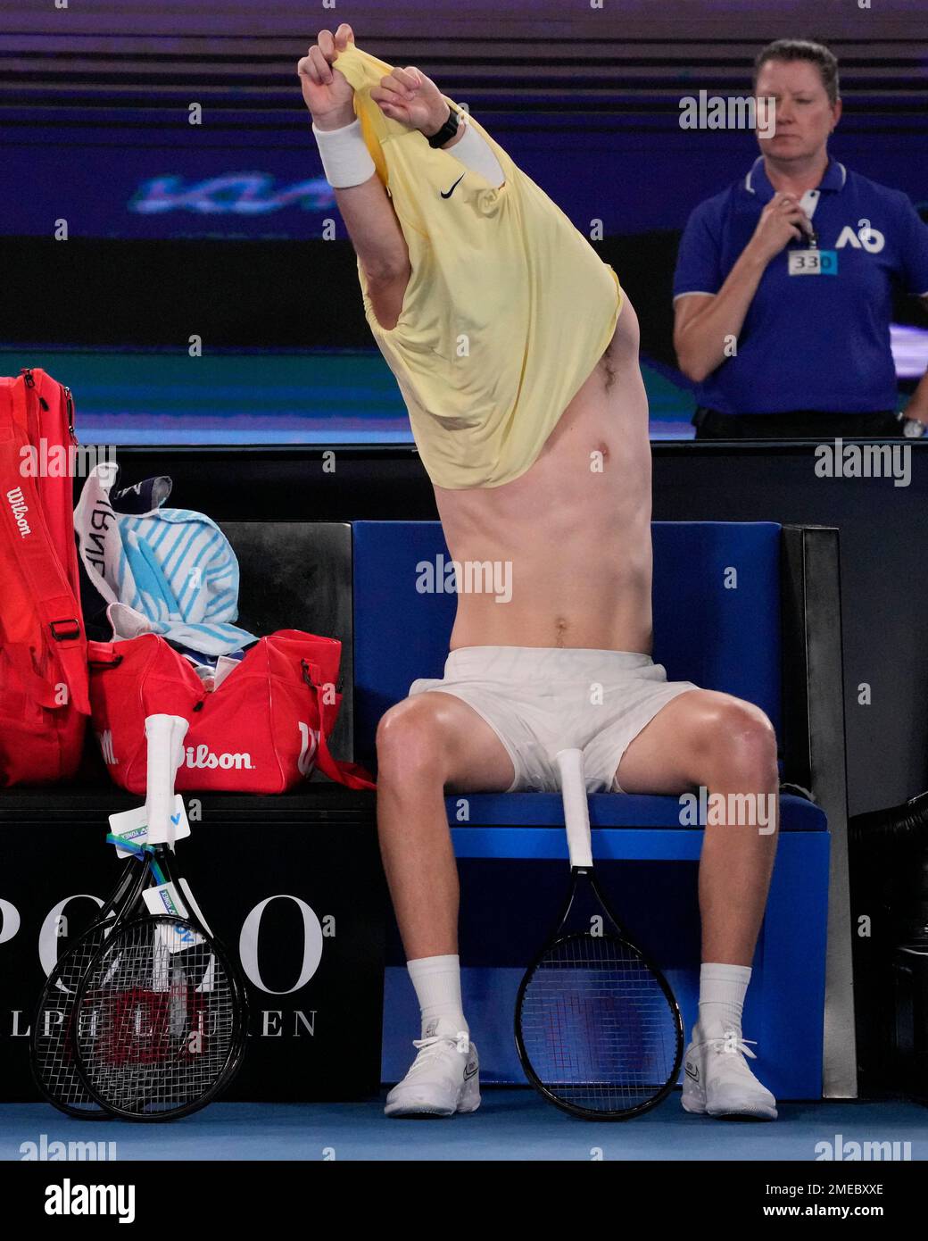 Sebastian Korda of the U.S. changes his shirt during his quarterfinal ...
