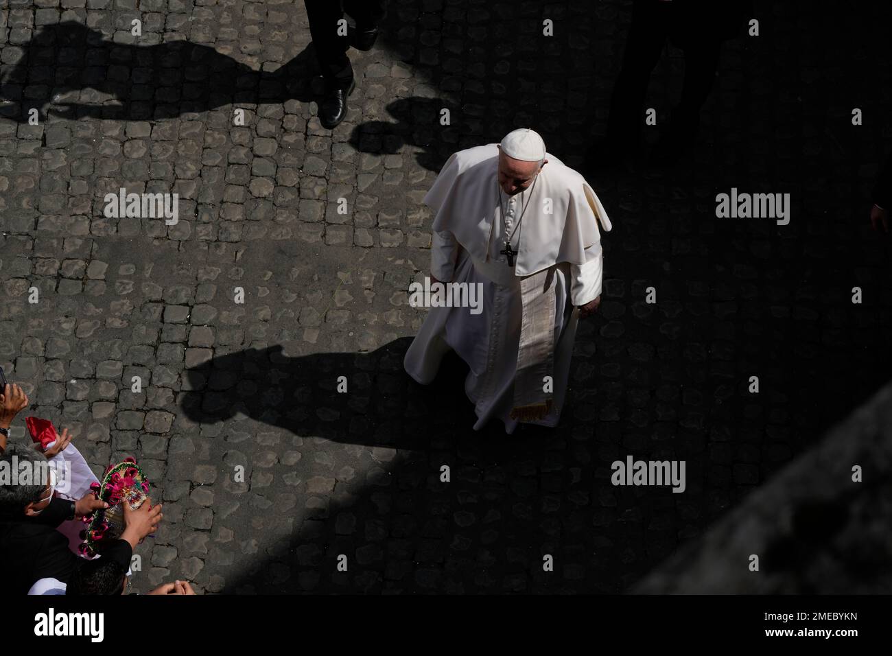Pope Francis walks in St, Damaso courtyard iat the Vatican during his ...